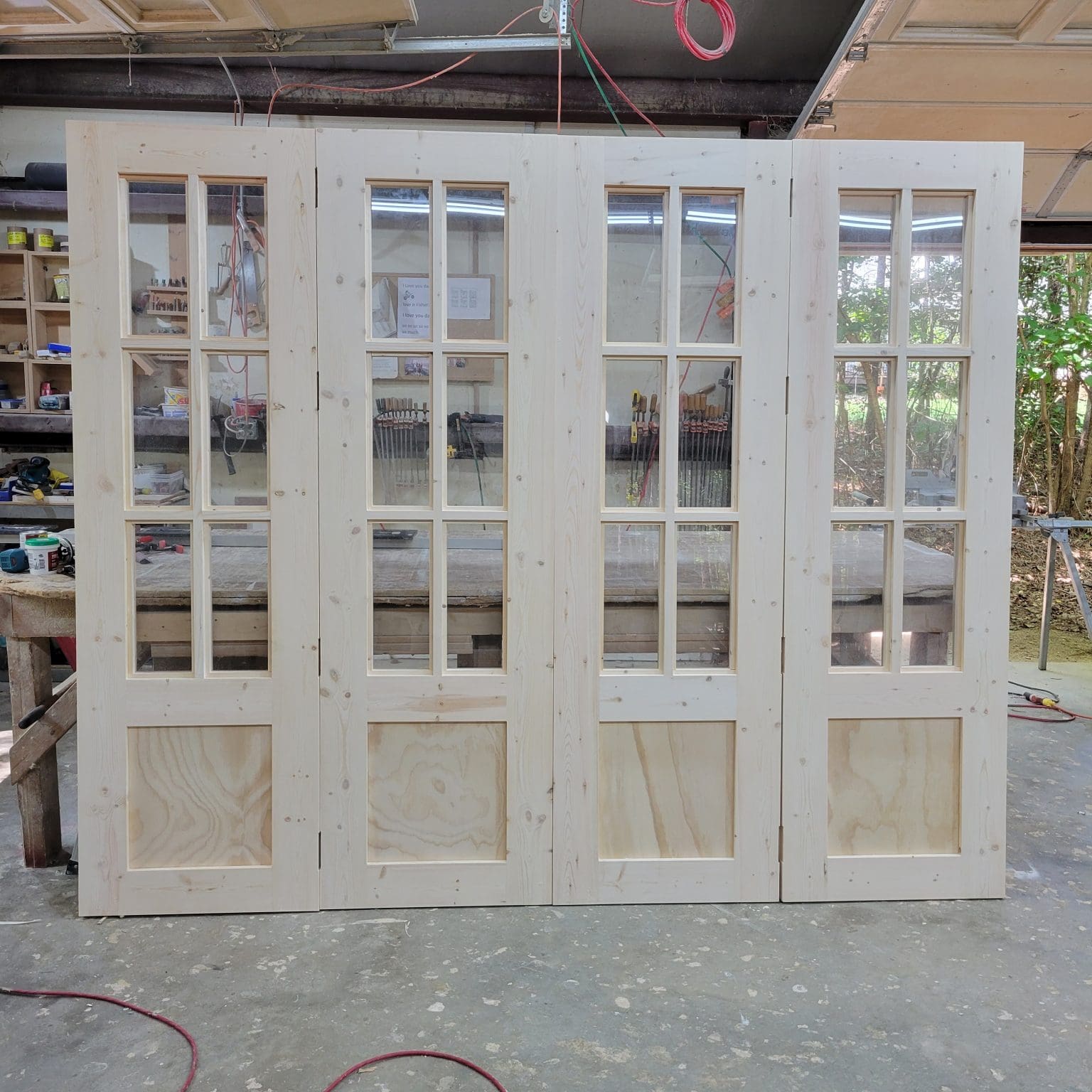 Side Folding and Bi Folding Doors - American Carriage Door bifold ...