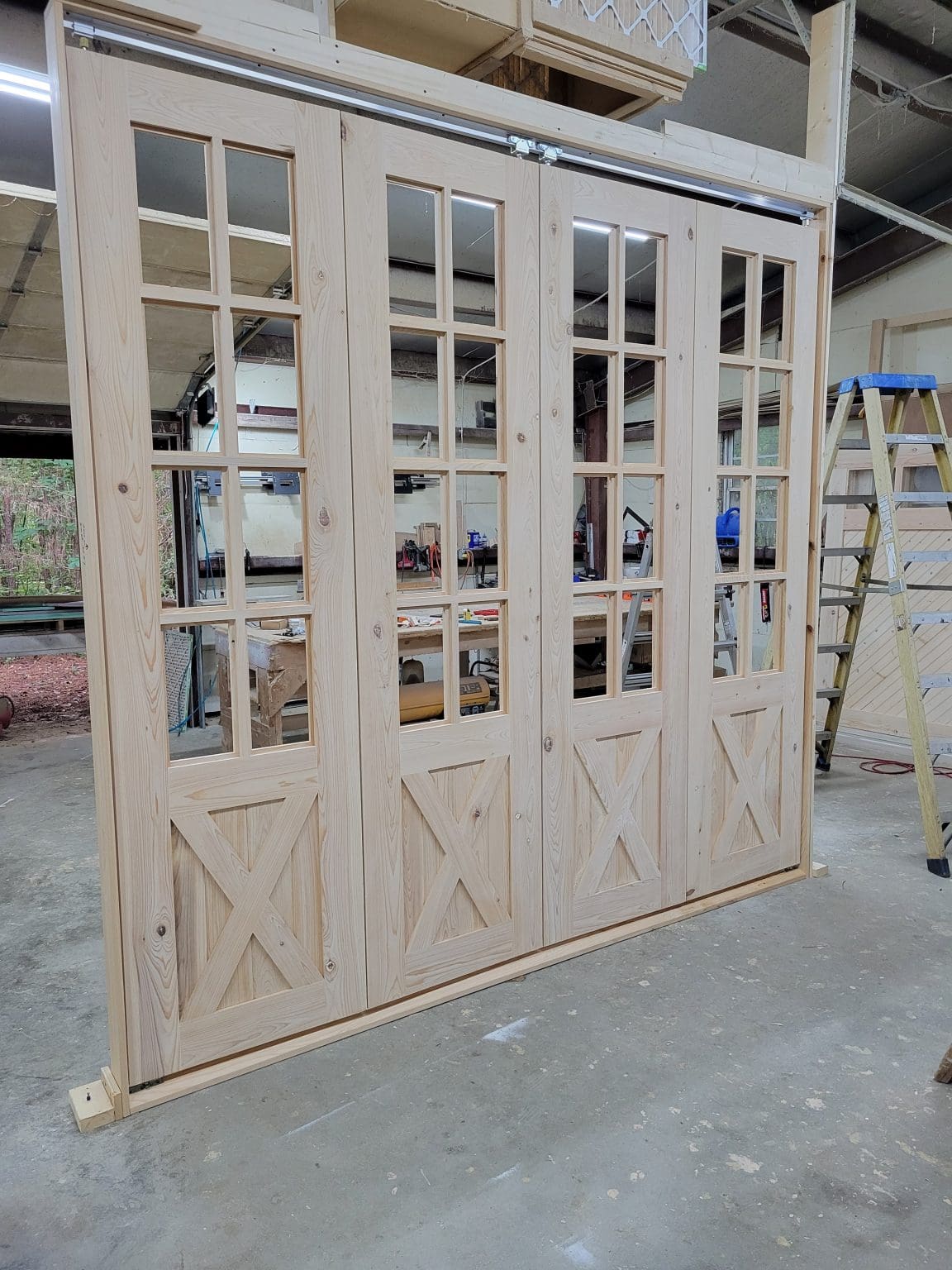 Side Folding and Bi Folding Doors - American Carriage Door bifold ...